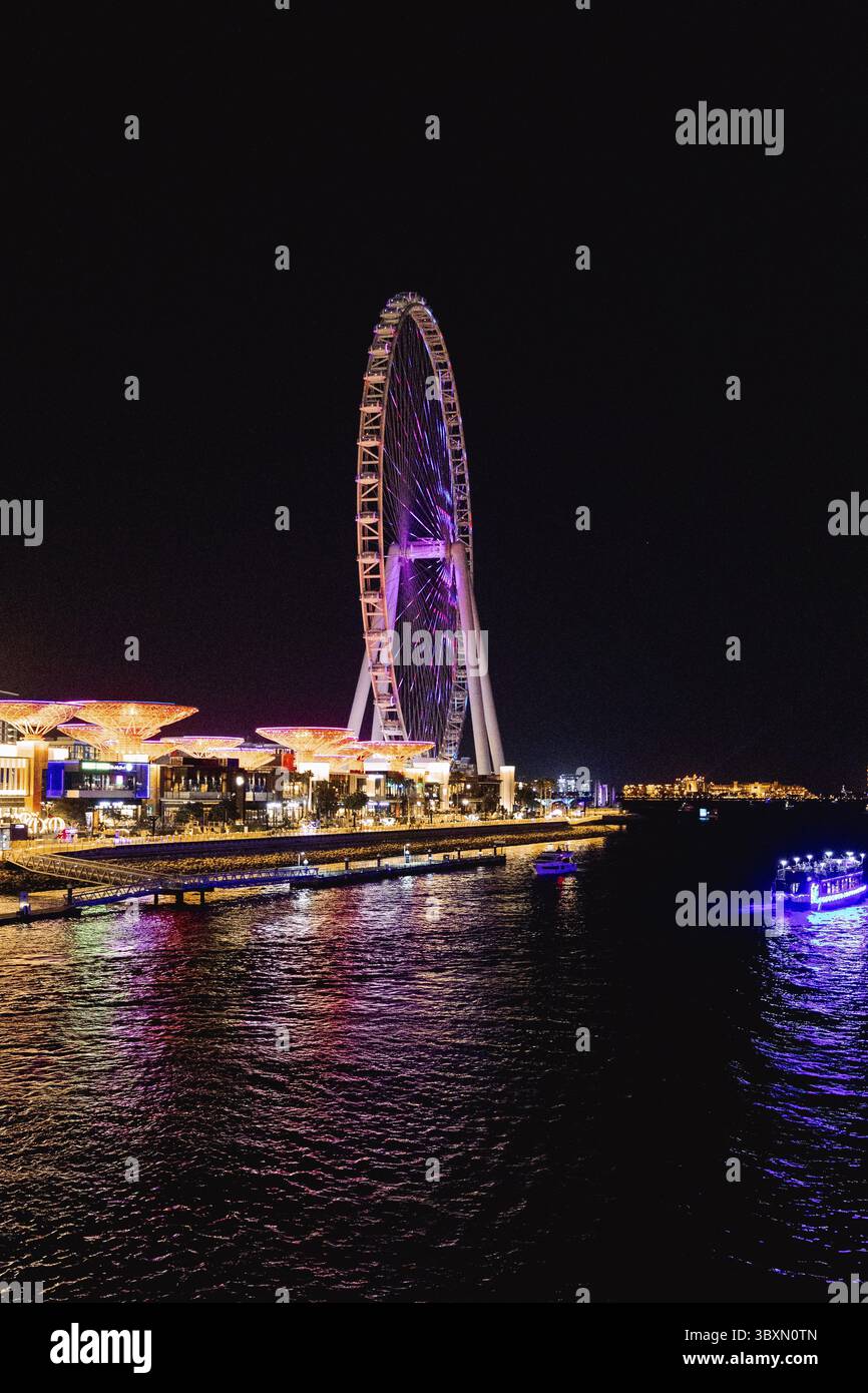 Panoramic view of Bluewaters Island at night. Famous Ain Dubai ...