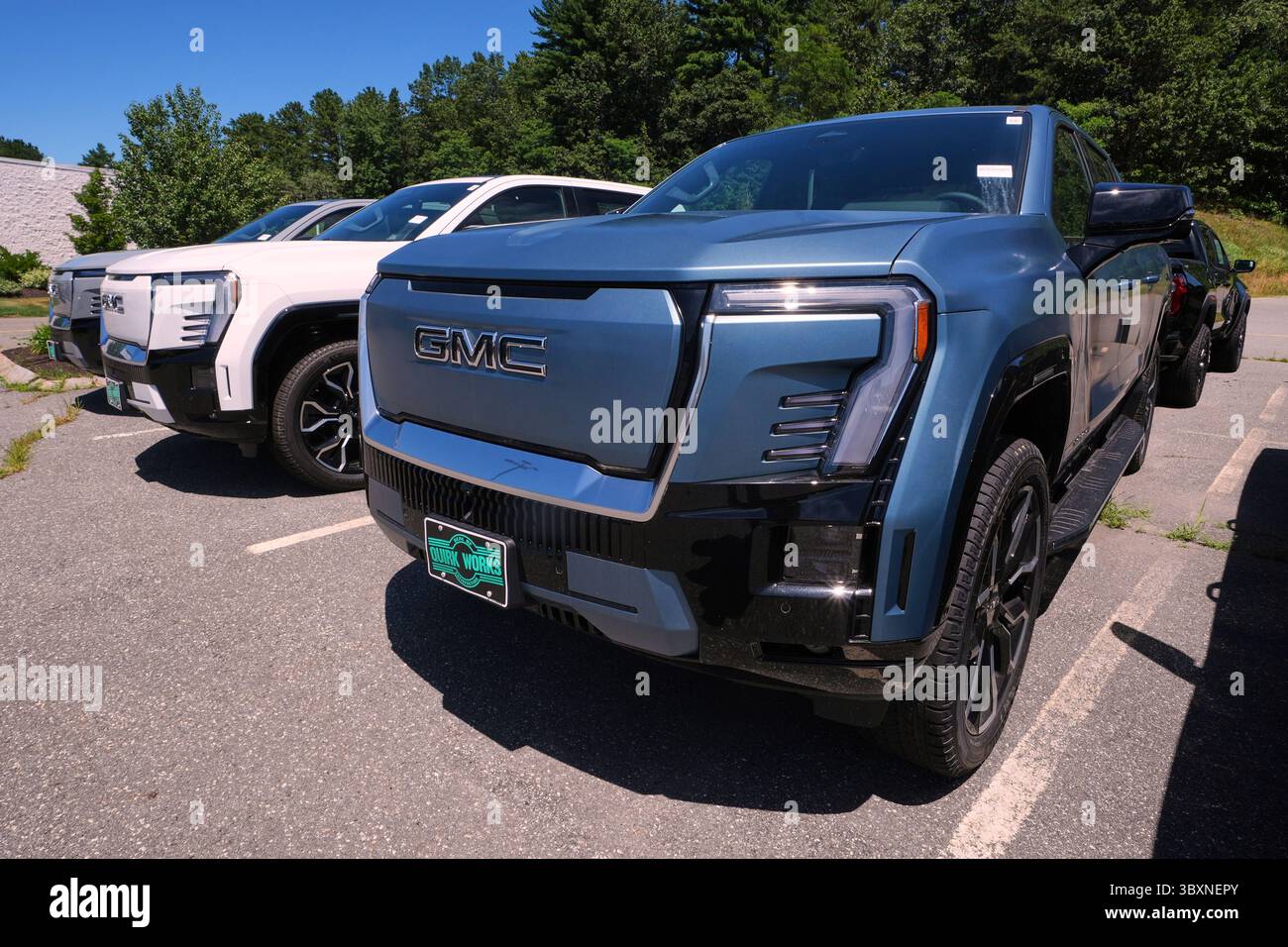 A selection of 2025 GMC Sierra EV Denali pick-up trucks, which are ...