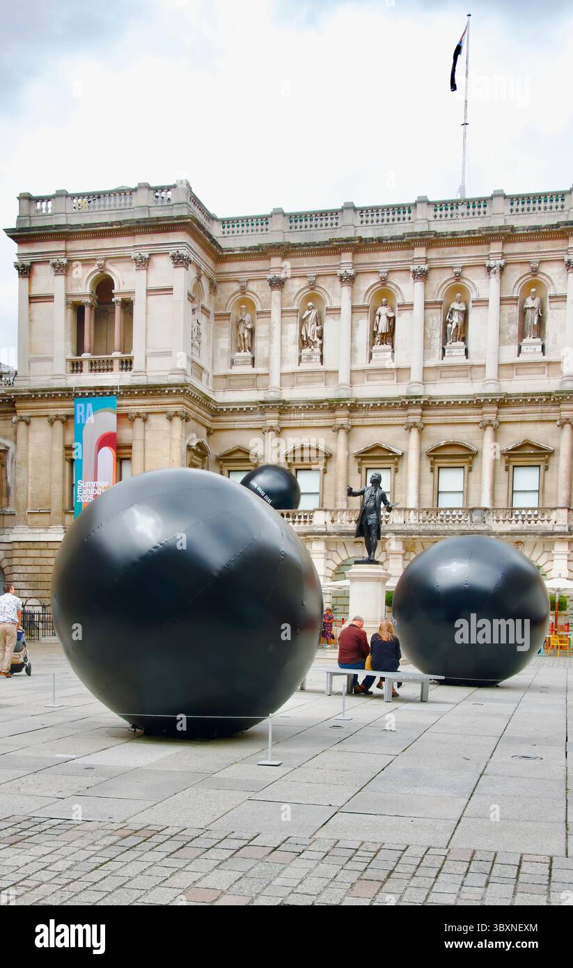 Courtyard installation by Ryan Gander inflatable black balls with ...