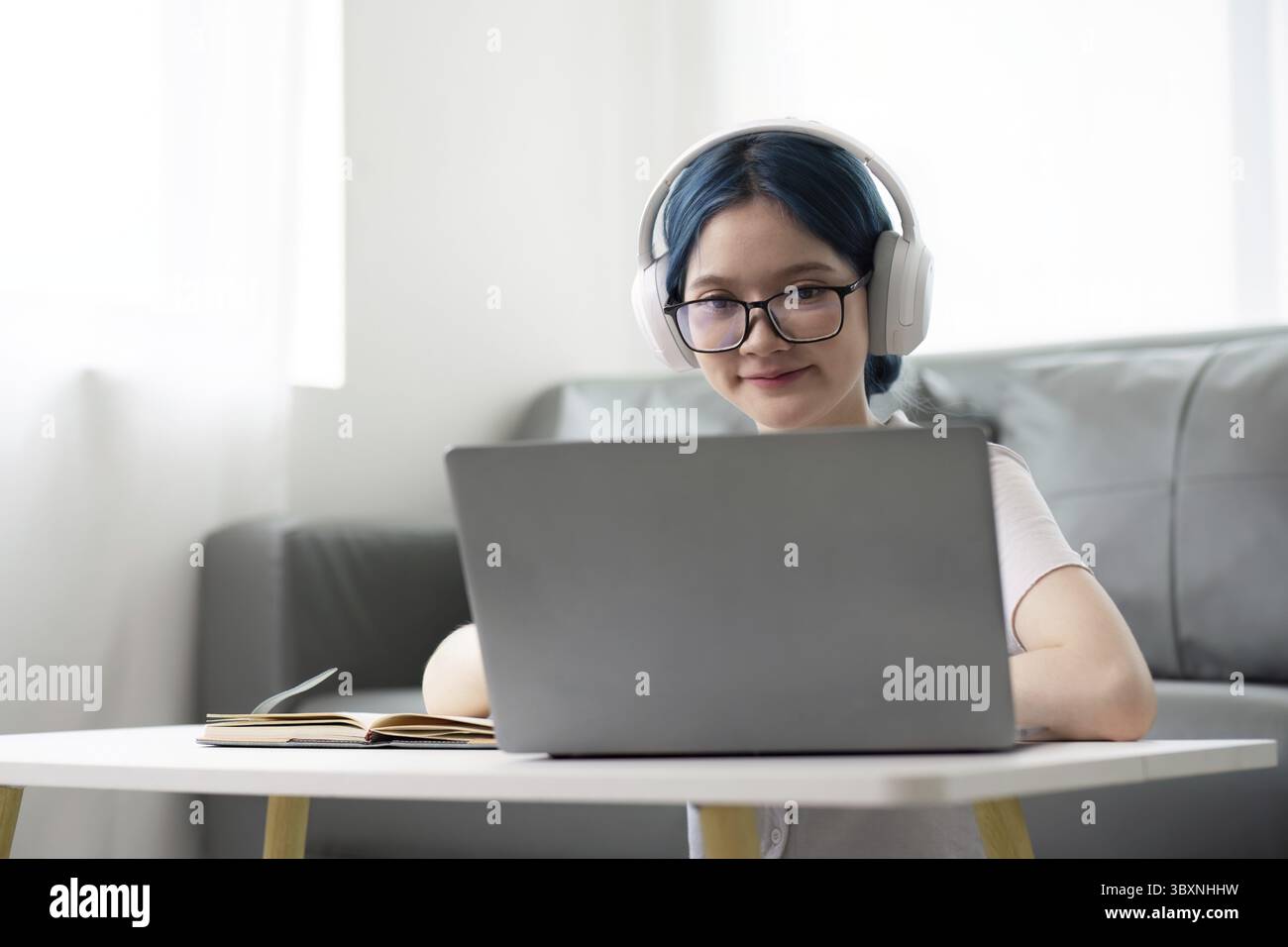 Teenage student laptop wearing headphones hi-res stock photography and ...