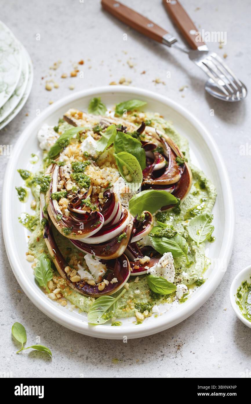 Roasted radicchio salad with feta, green tahini, Pine nuts and basil ...