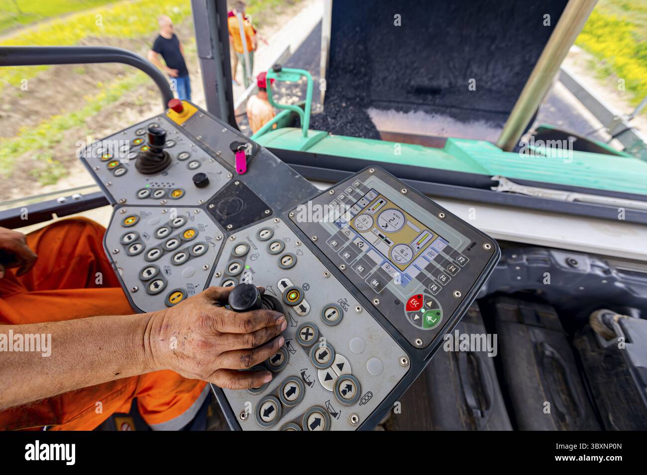 Worker operator controlling tarmac hi-res stock photography and images ...