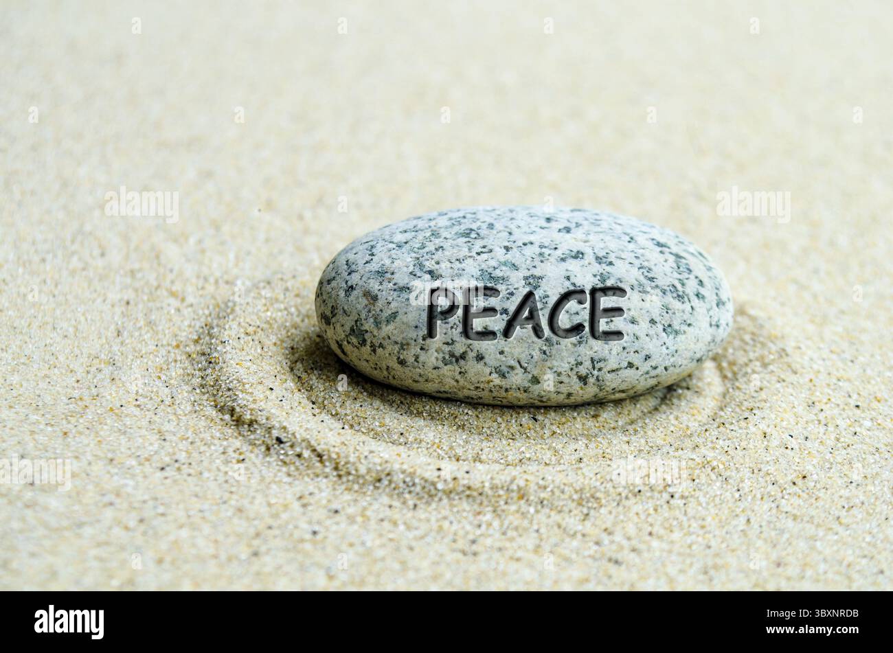 Peace text engraved on stone with sand beach background. Peace of mind ...