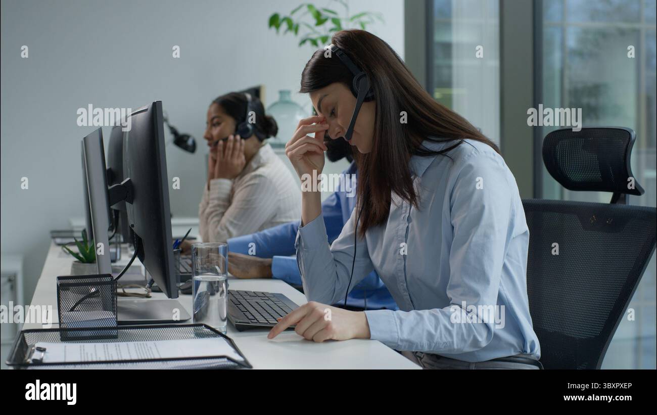 Tired exhausted Caucasian business woman callcenter worker headset ...
