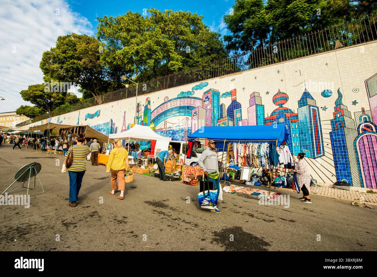 Outdoor vendors around the Santa Clara Market, Alfama district, Lisbon ...