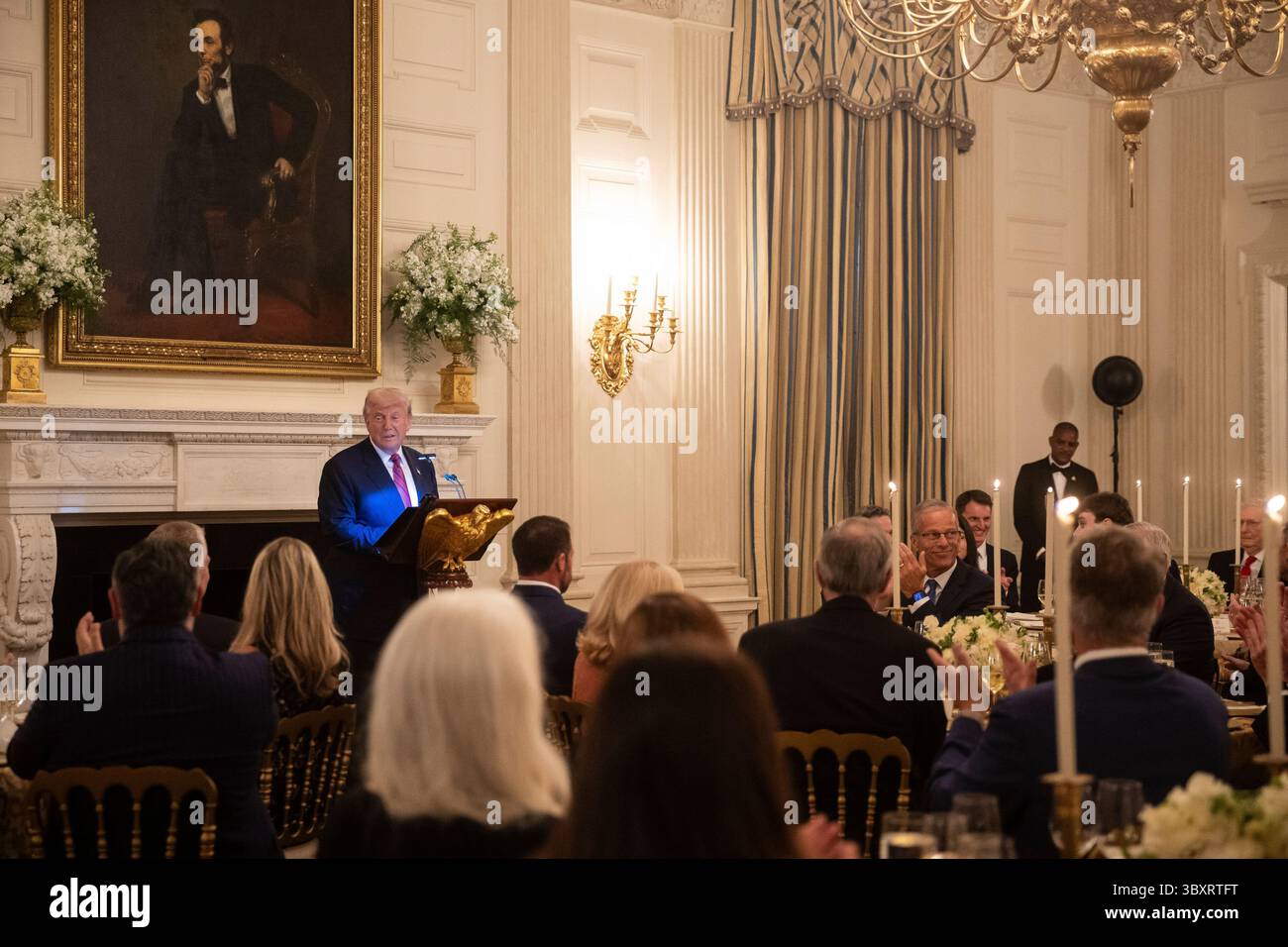 President Donald Trump delivers remarks during a dinner with Republican ...