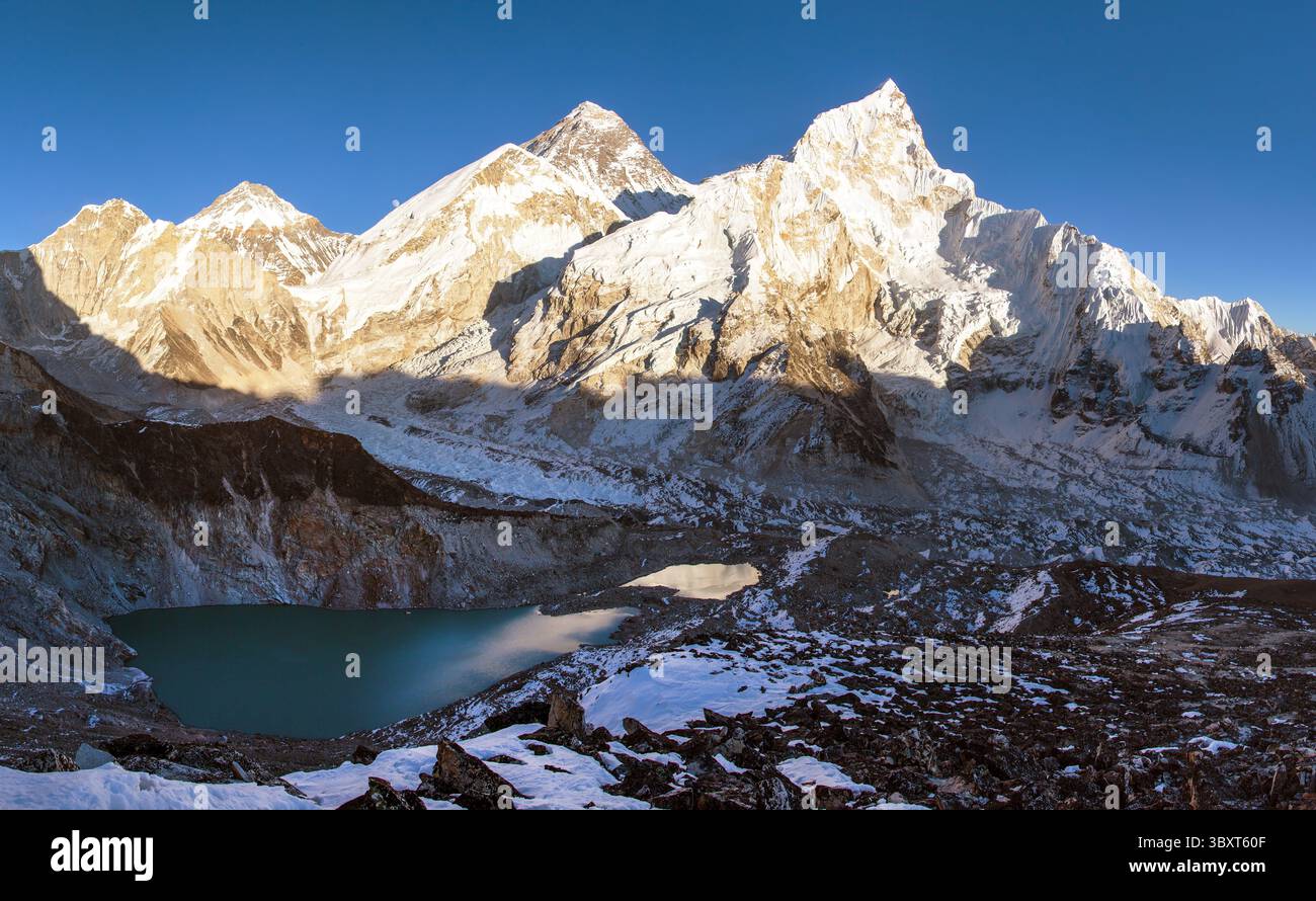 Evening colored view of Mount Everest with blue sky and lakes from Kala ...