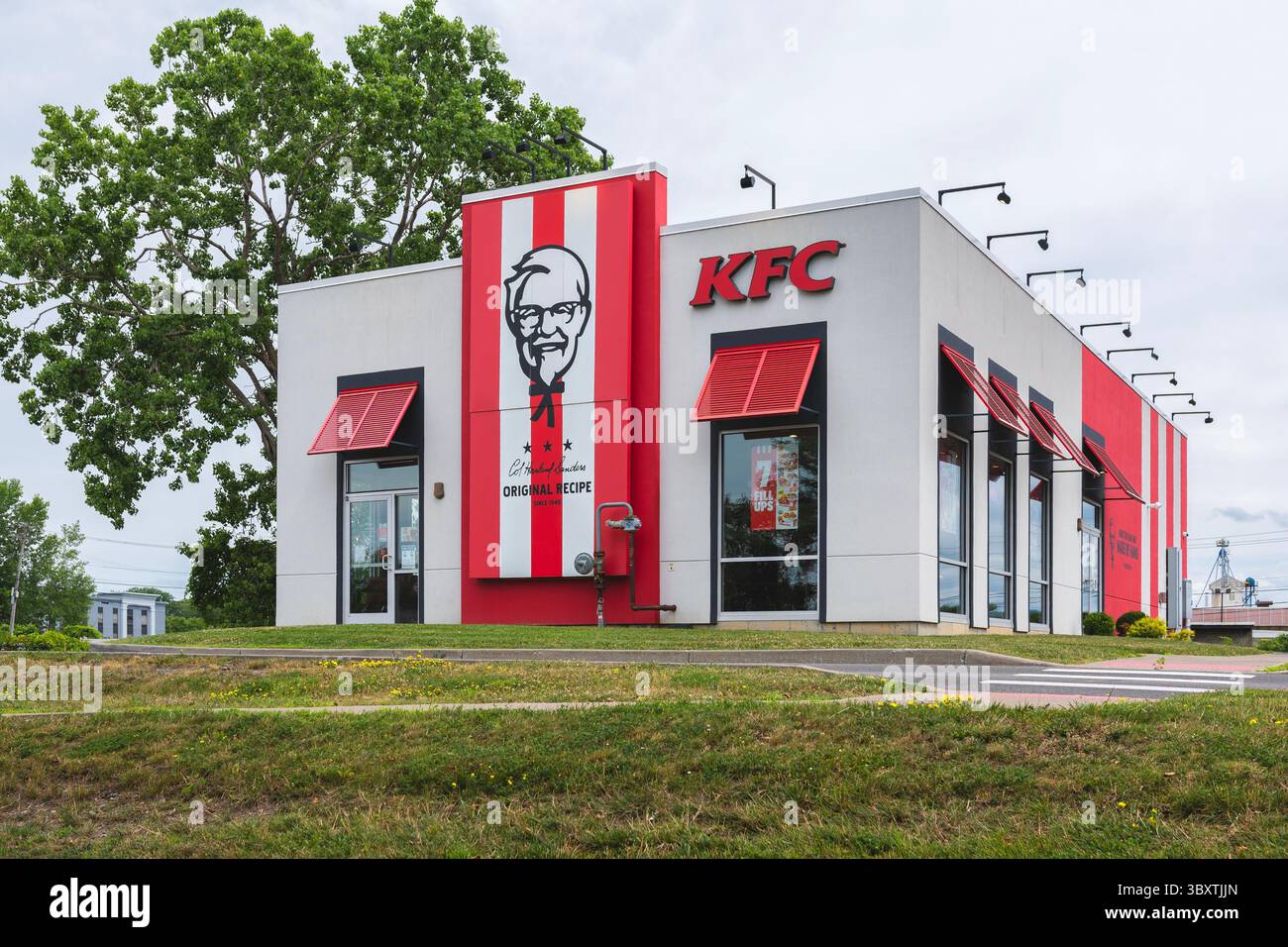 Utica, NY - Jul 9, 2025: Close-up evening view of KFC (Kentucky Fried ...