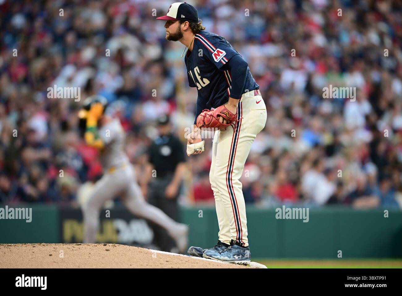 Cleveland Guardians pitcher Slade Cecconi reacts as Athletics' Brent ...