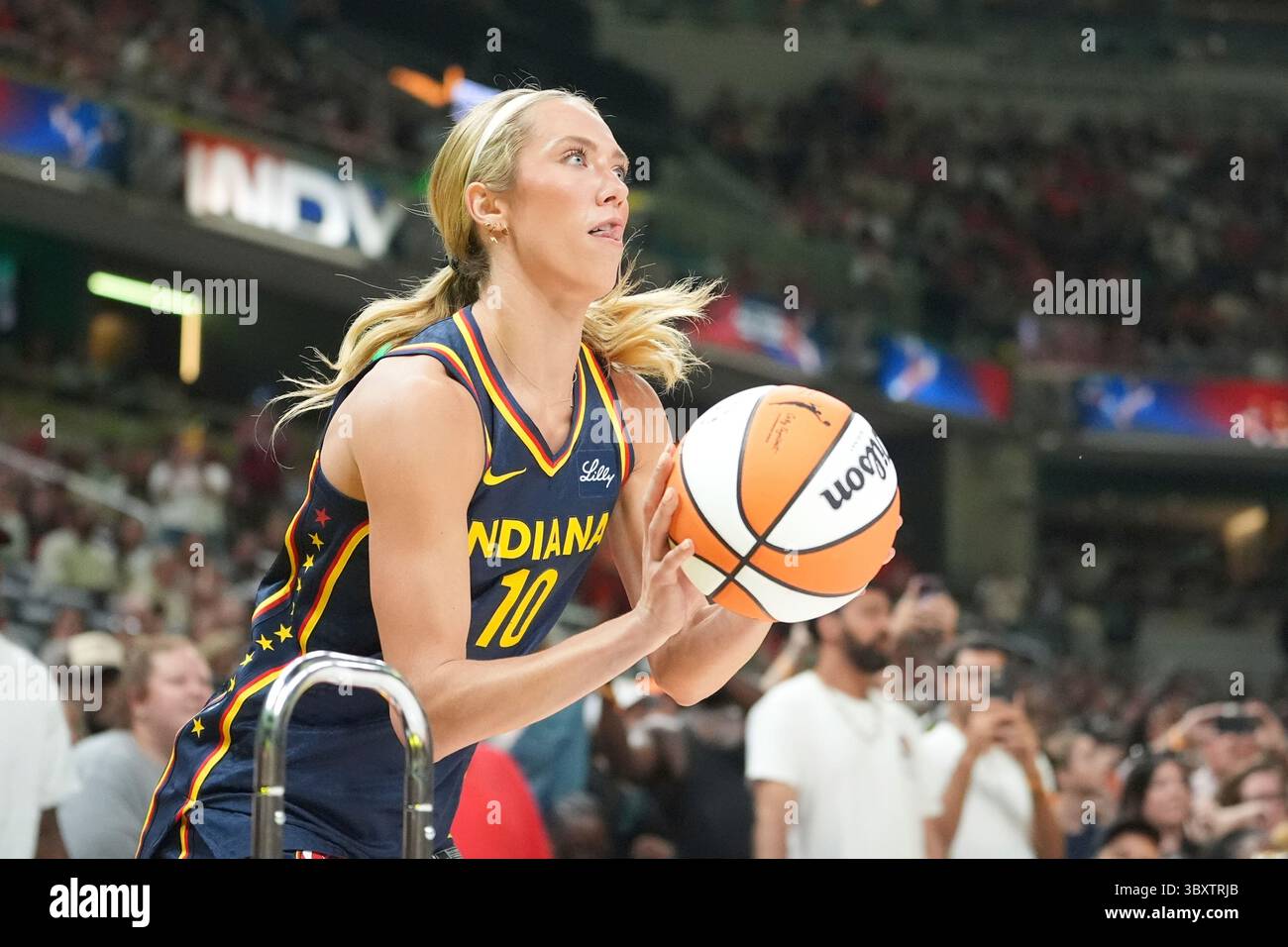 Indiana Fever's Lexi Hull shoots during the 3-point contest at the WNBA ...