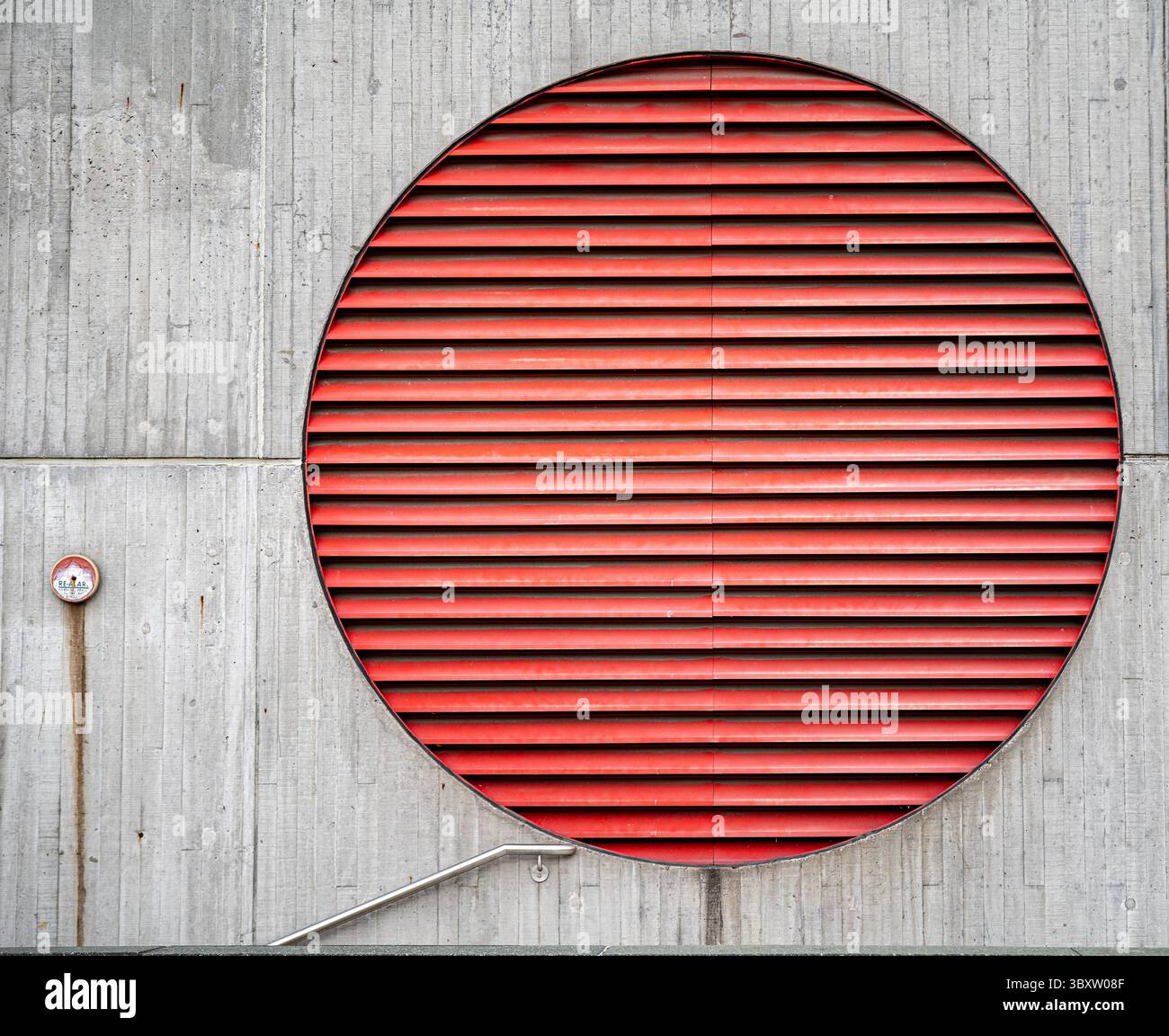 Red Circle Concrete Wall Vent provides ventilation to the building. The ...