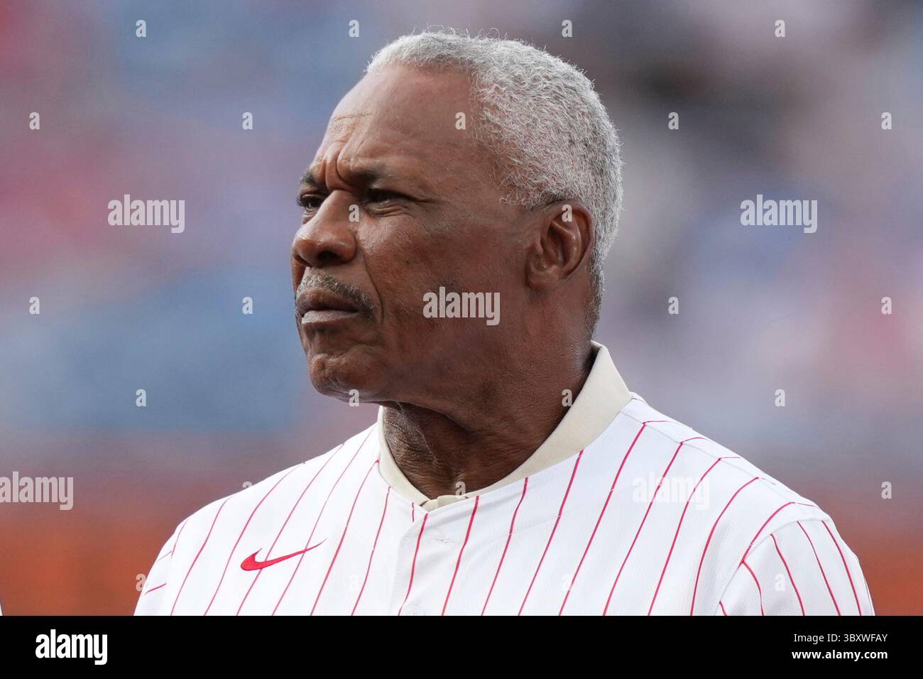 Former Philadelphia Phillies' Juan Samuel stands before a baseball game ...