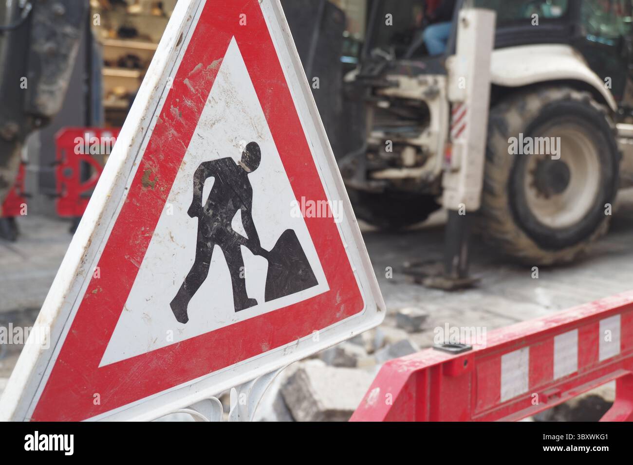 Construction work ongoing near urban street Stock Photo - Alamy