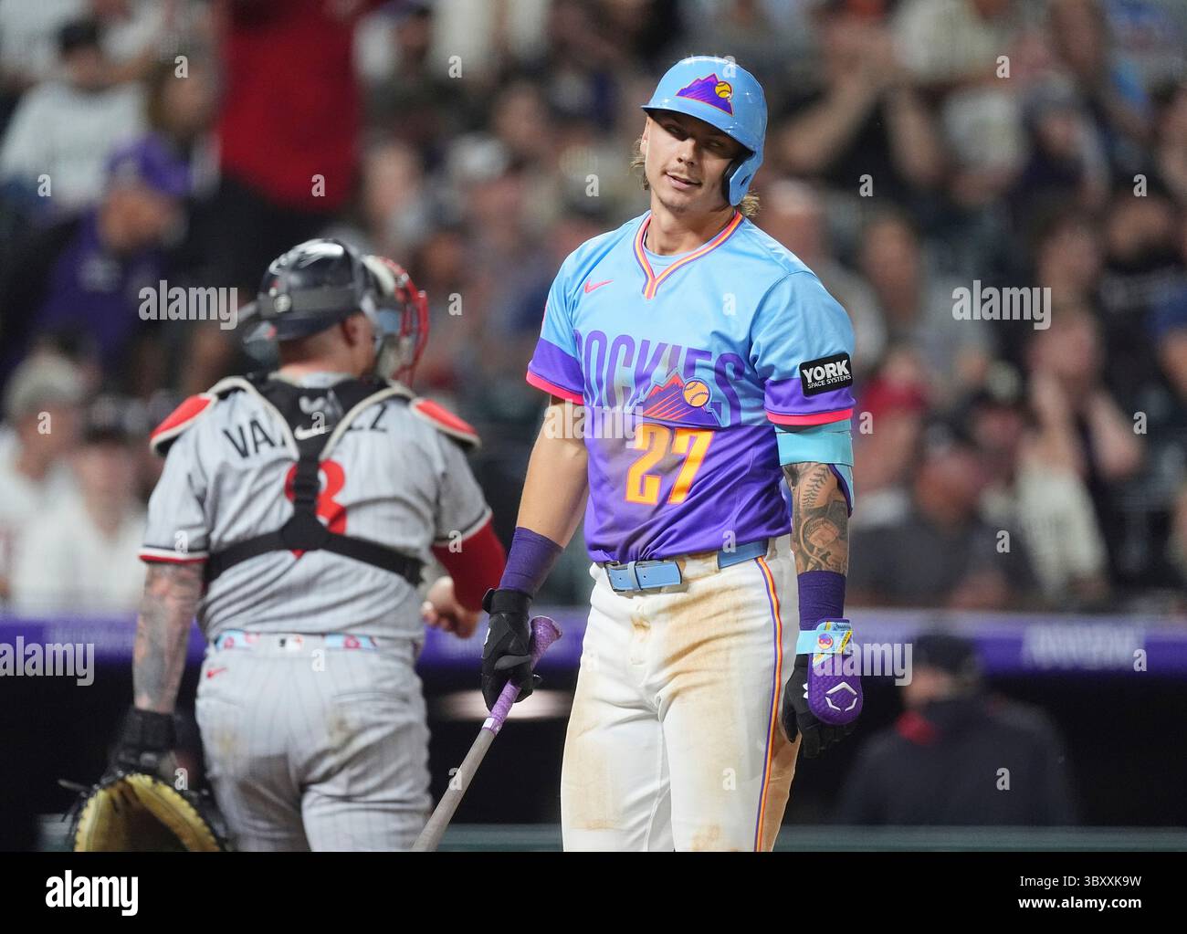Colorado Rockies' Jordan Beck reacts after striking out against ...