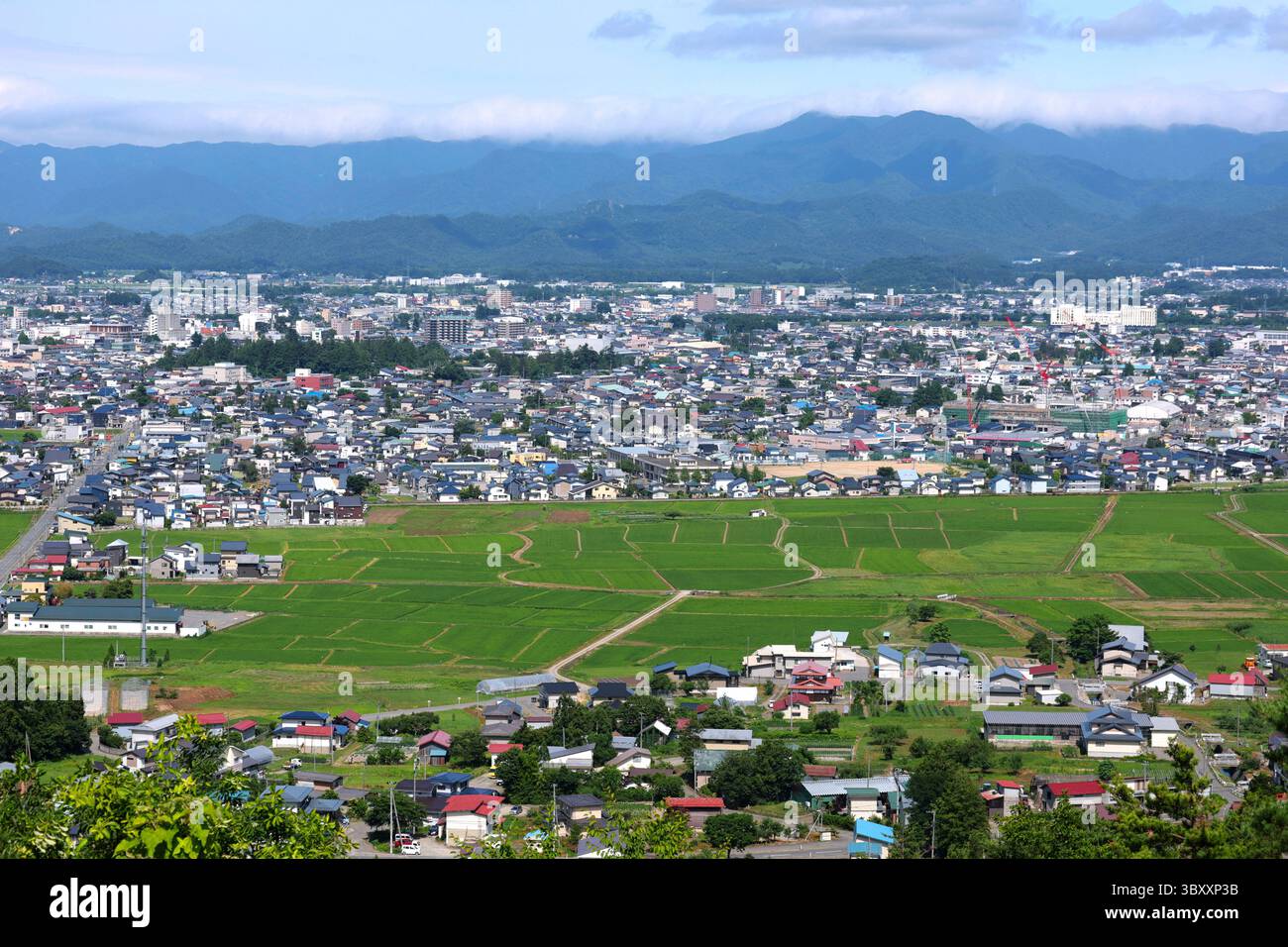 A photo shows a rural landscape in Yonezawa City, Yamagata Prefecture ...