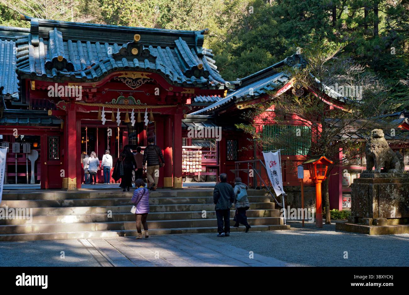 Visitors at Hakone Jinja Shinto shrine "honden" (箱根神社本殿) main hall in a ...