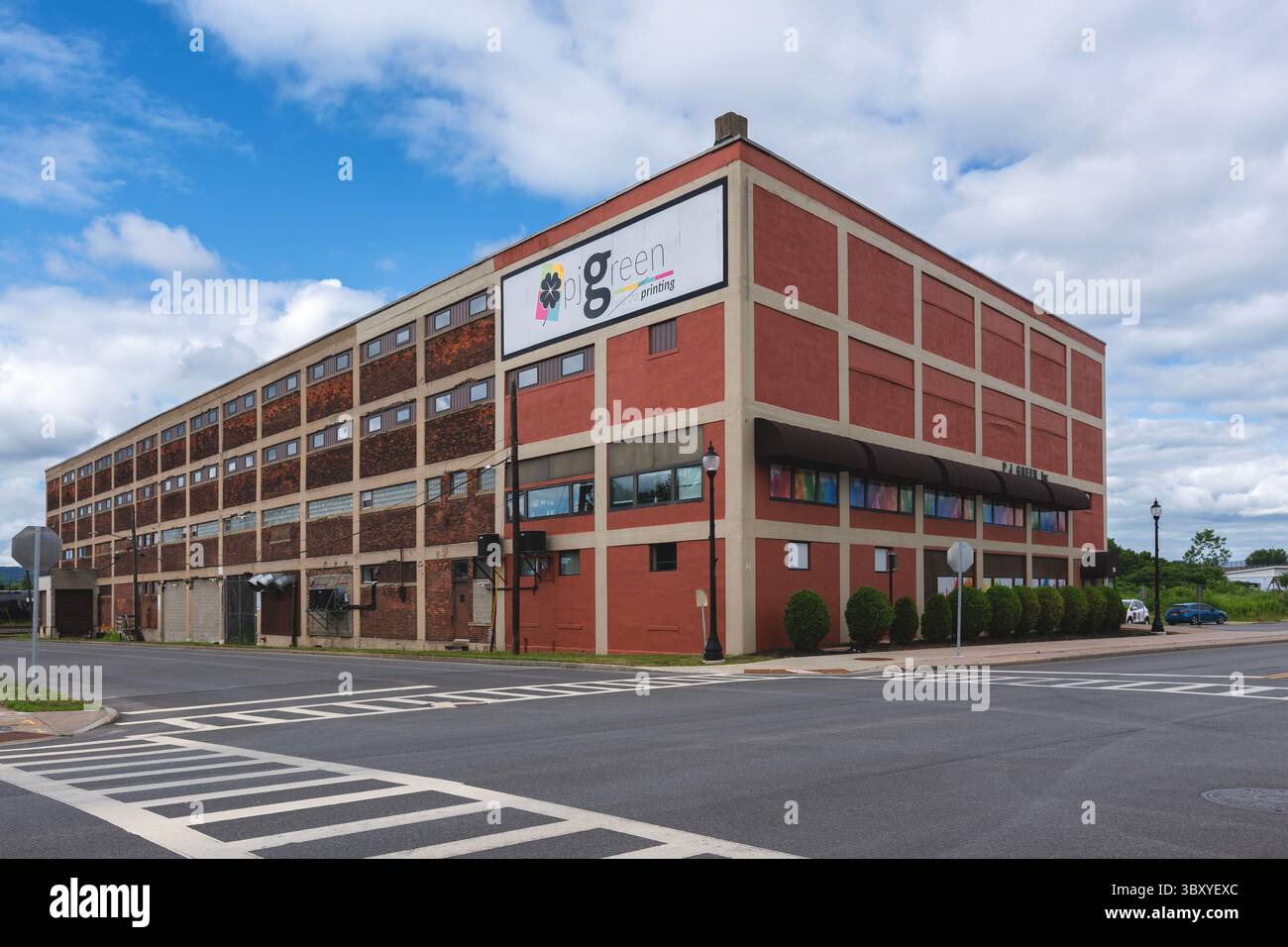 Utica, NY - Jul 8, 2025: Ultra-wide view of PJ Green, is a printing and ...