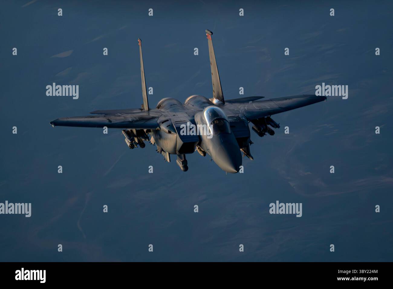 A U.S. Air Force F-15E Strike Eagle returns to combat air patrol over ...