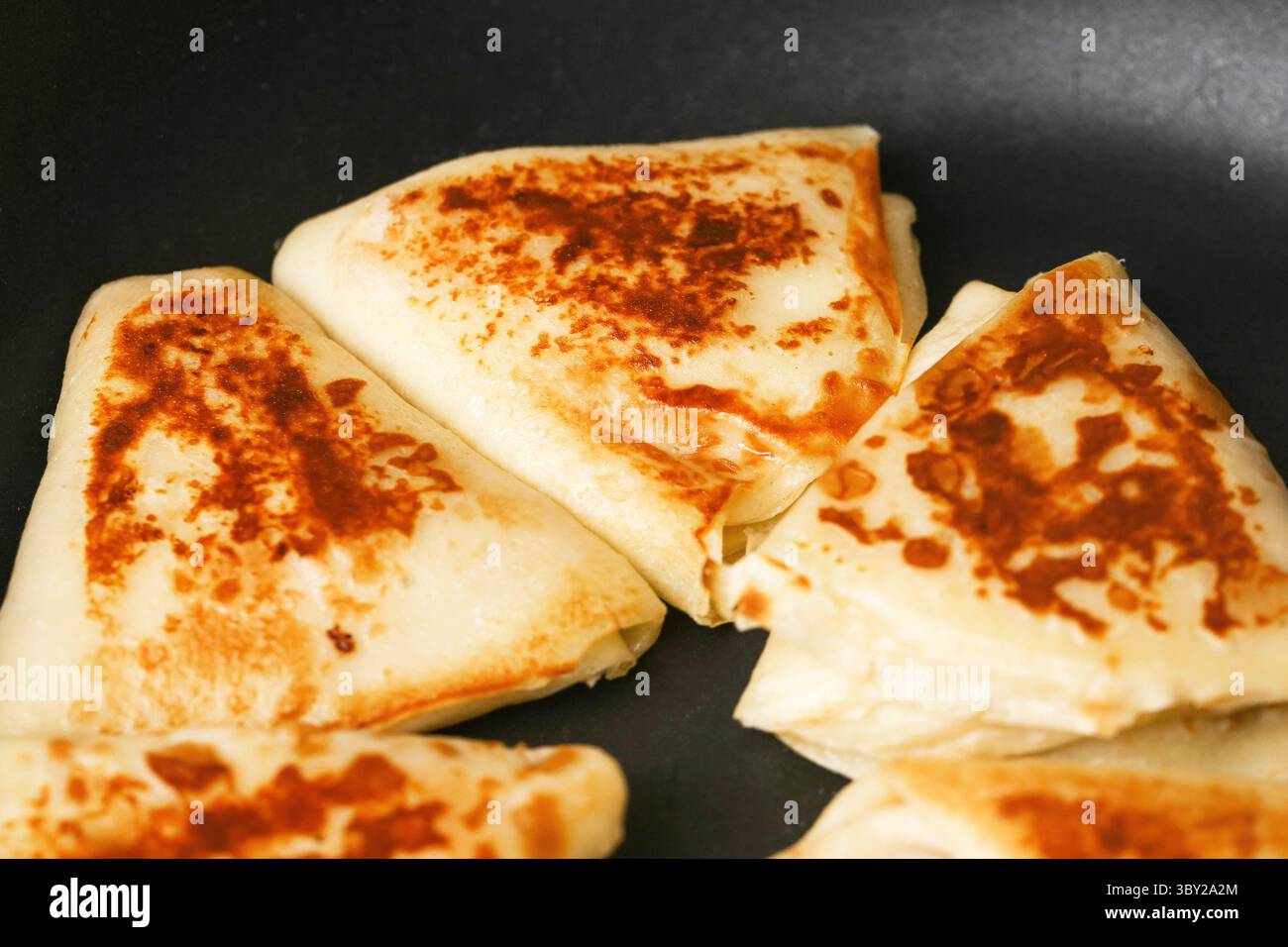 Crispy fried crepes stuffed hi-res stock photography and images - Alamy