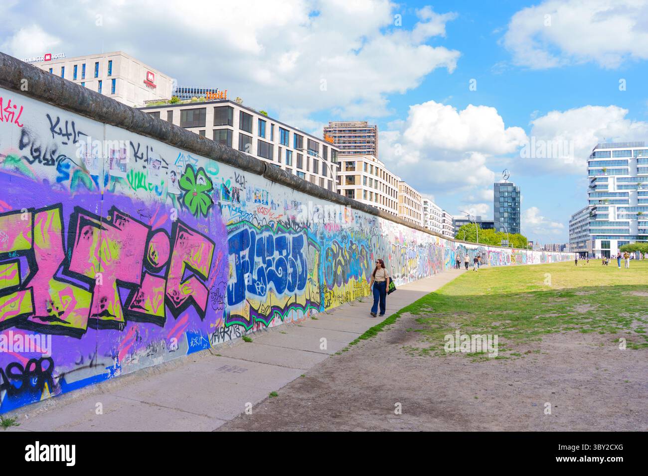 Berlin, Germany - May 30, 2025: Graffiti on the Berlin Wall with the ...