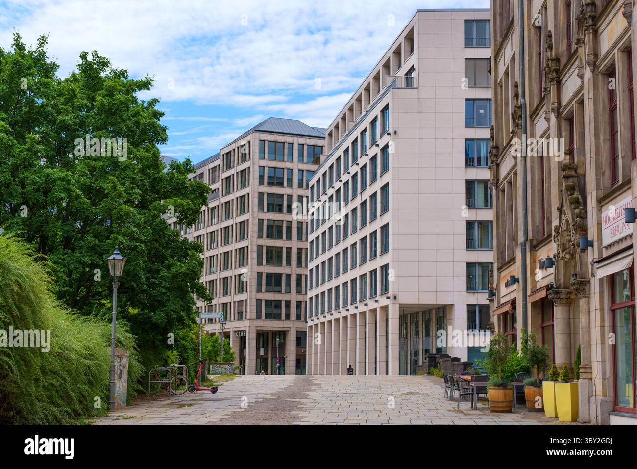 Berlin, Germany - June 1, 2025: Contemporary buildings flanking a wide ...