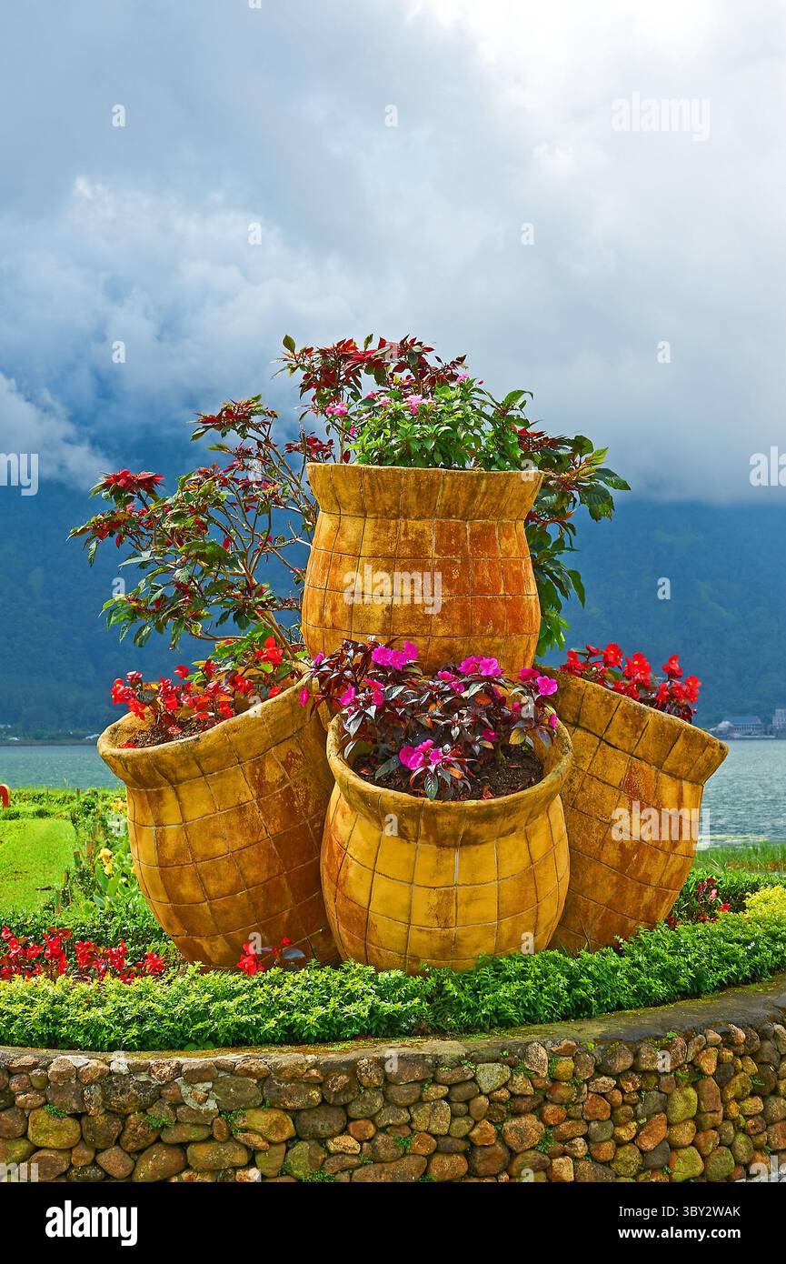 Clay pots and colourful flowers at the Hindu temple at Ulan Danu ...