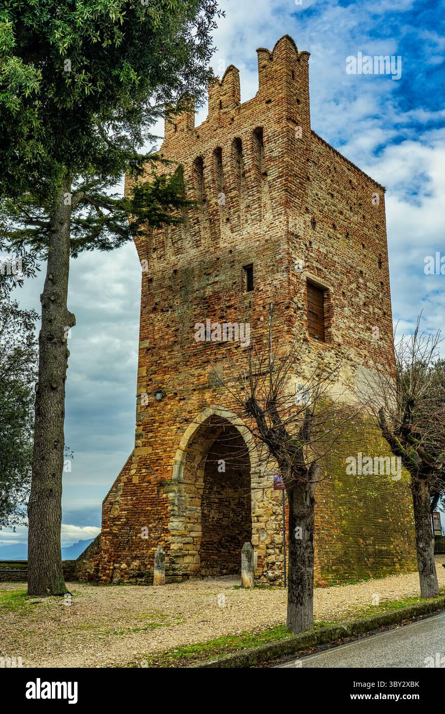 Medieval tower with Ghibelline battlements on the Monte Antico Gate in ...