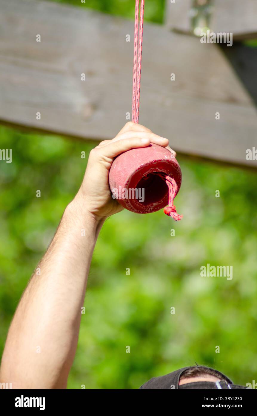 Hand gripping large red hi-res stock photography and images - Alamy