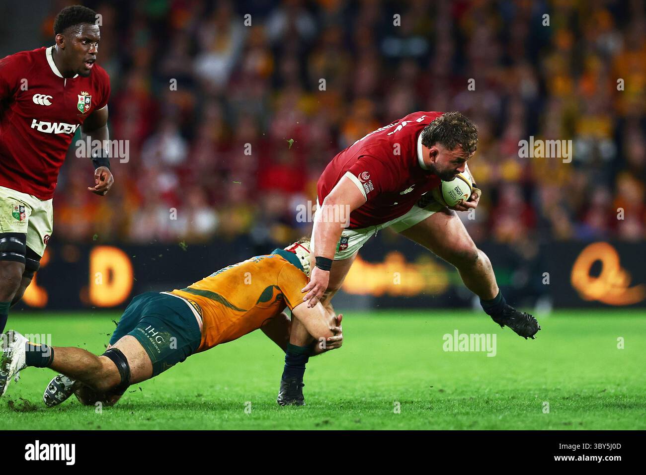 Will Stuart of the British & Irish Lions, right, is tackled by ...