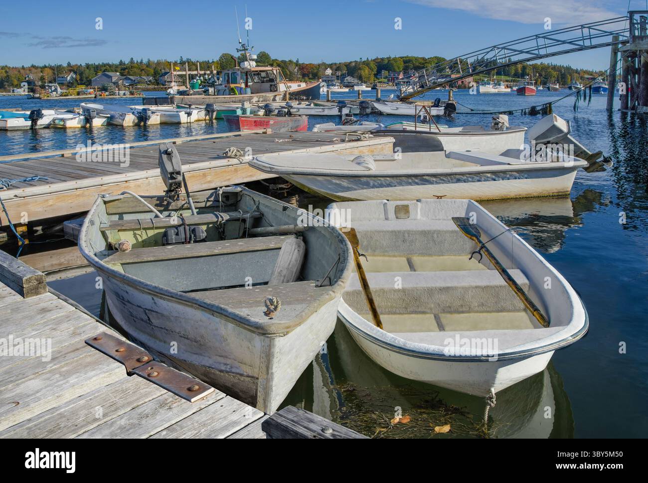 Small Boats at Floating Docks: Small fishing boats tie up at a series ...