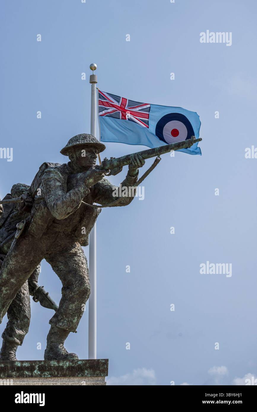 Ver-sur-Mer, France - June 8, 2025: Statue of soldiers with flags at ...