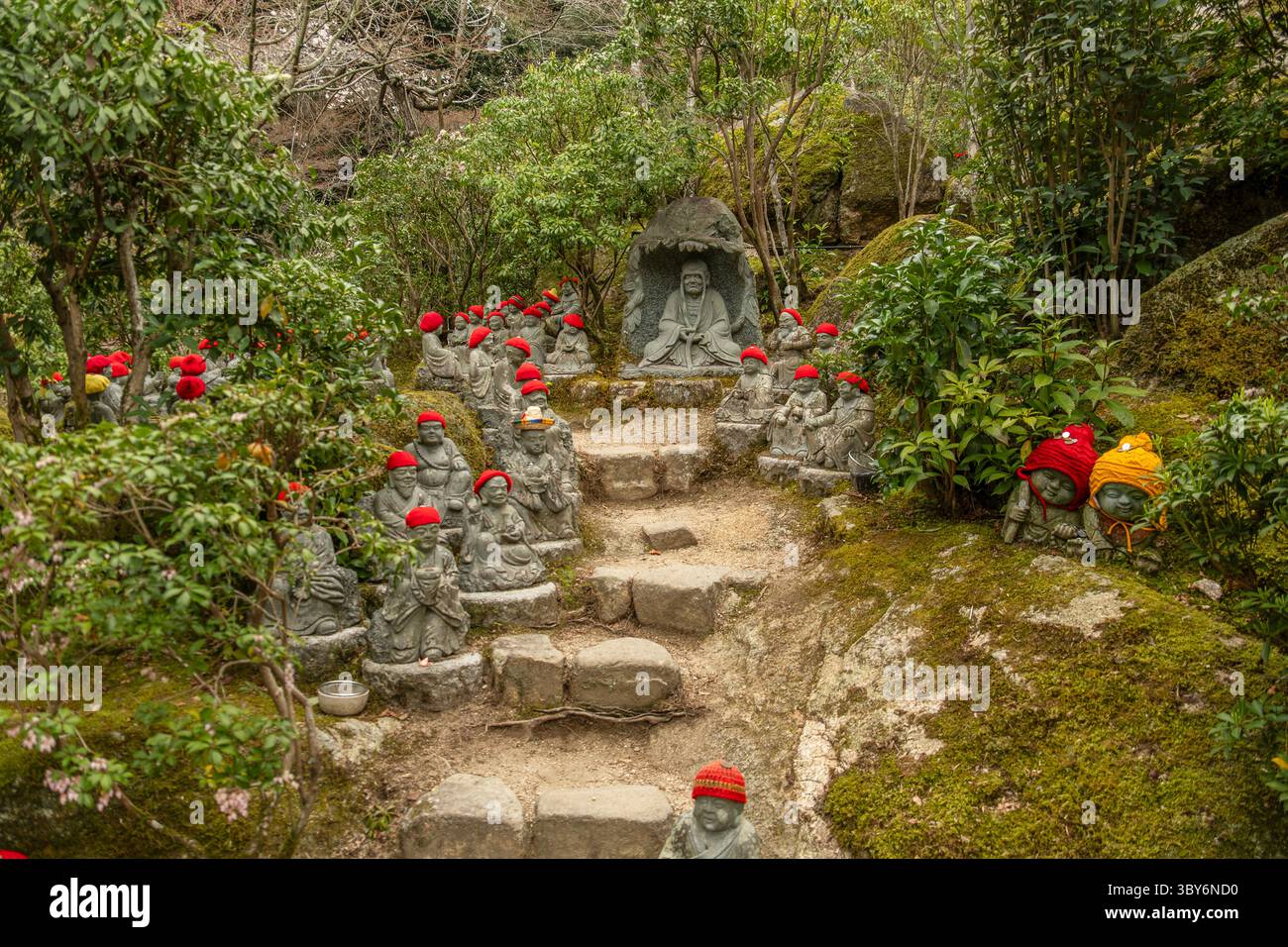 Path to the Daisho-in Temple, adorned with 500 Rakan Statues in knitted ...