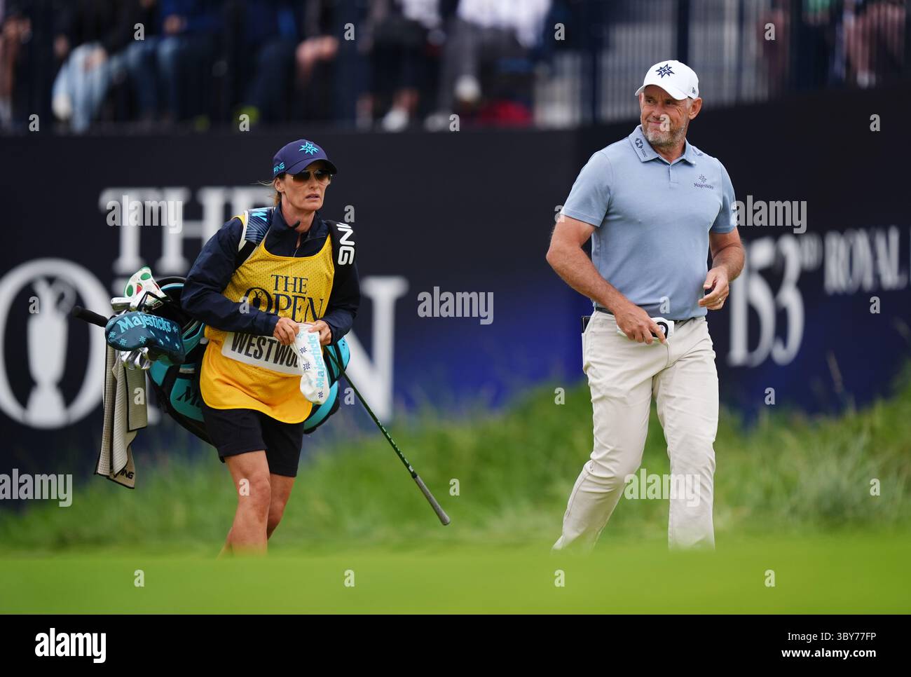 England's Lee Westwood with his wife and caddie Helen Storey during day ...