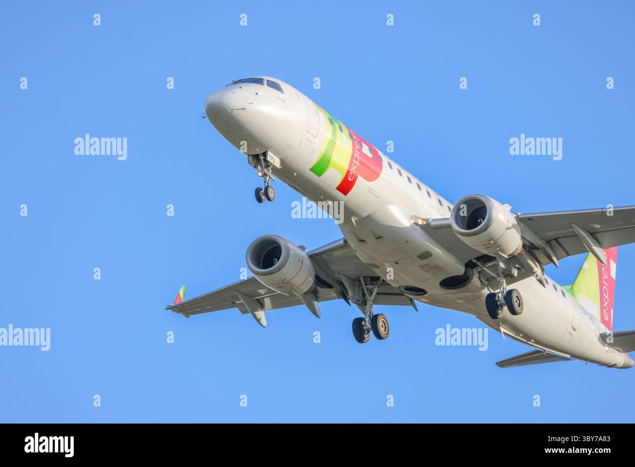 Tap portugal express embraer e190 aircraft landing at lisbon humberto ...