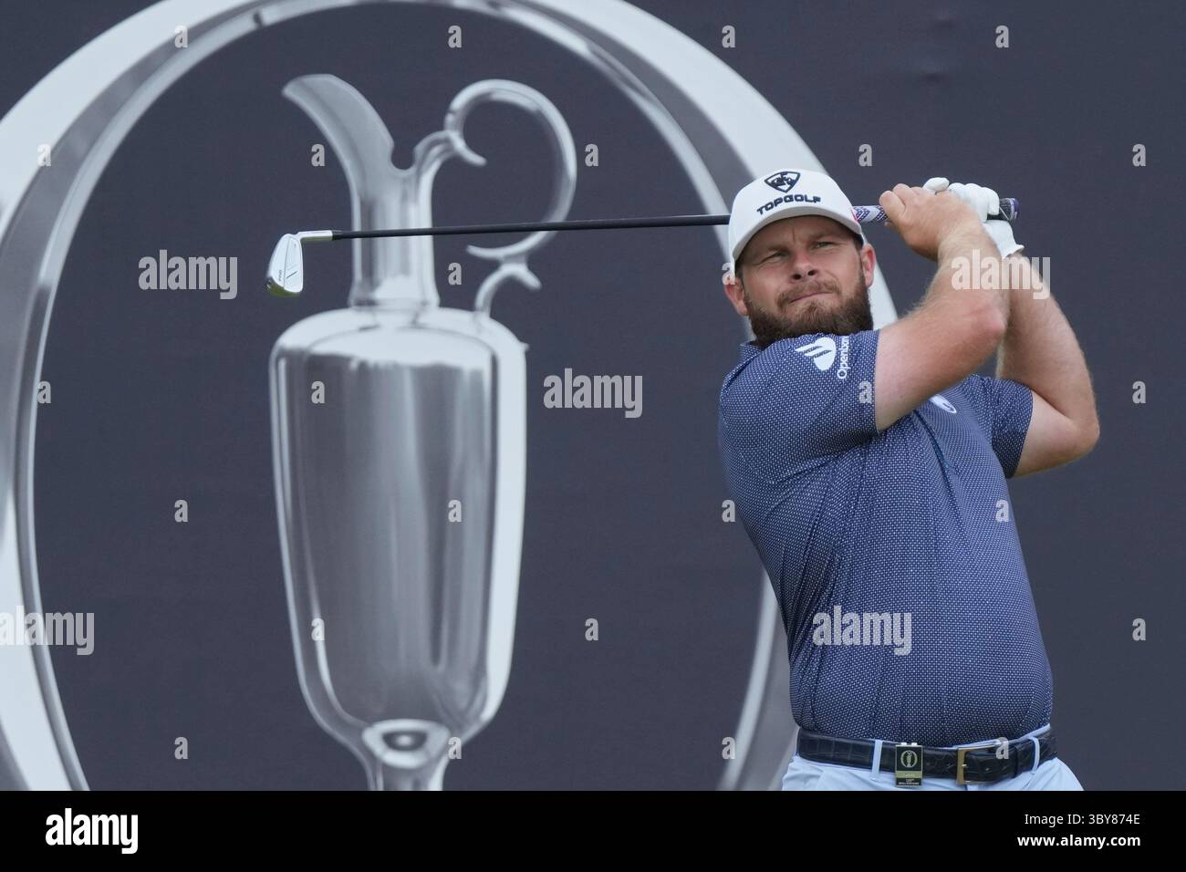 Tyrrell Hatton of England plays from the 1st tee uring the third round ...