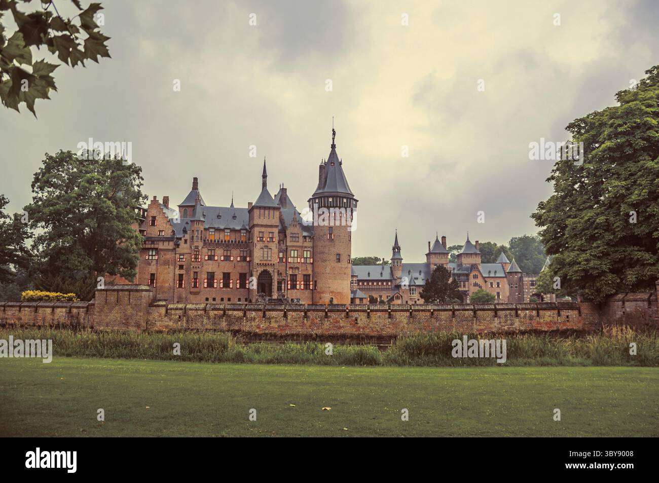 De Haar Castle with brick towers in rainy day, near Utrecht. Of ...