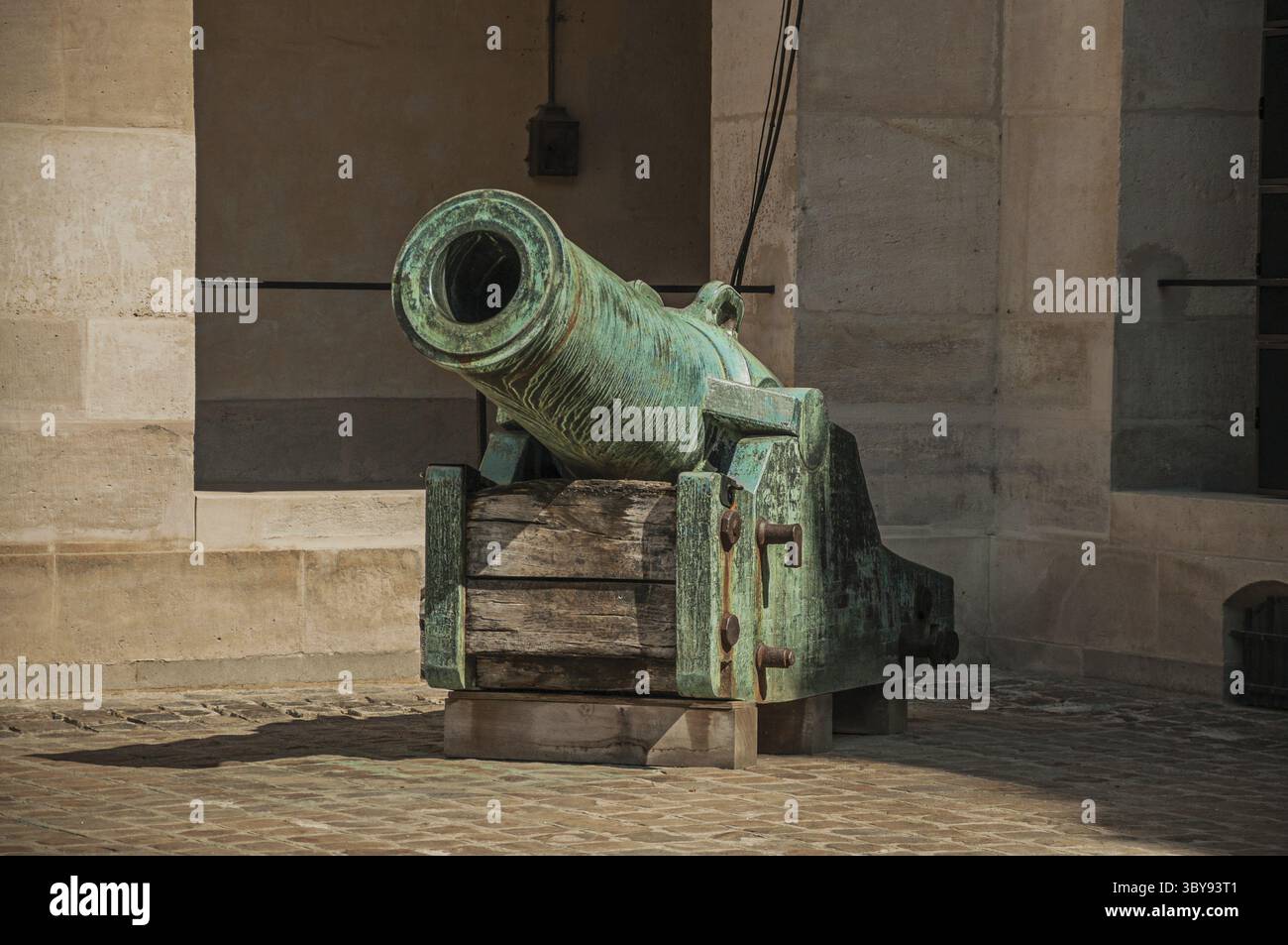 Close-up of old bronze cannon in the inner courtyard of the Les ...