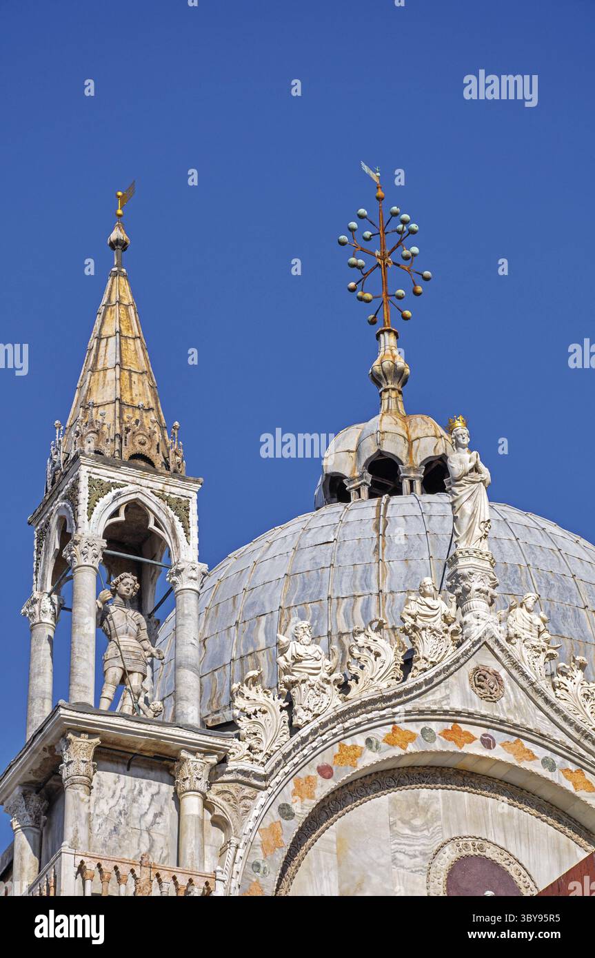 Close-up of marble sculptures and dome in typical Venetian style on the ...