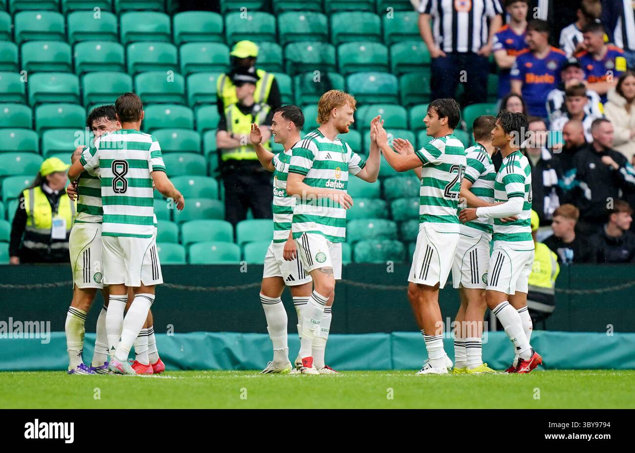 Celtic's Liam Scales (fourth right) celebrates after scoring his sides ...