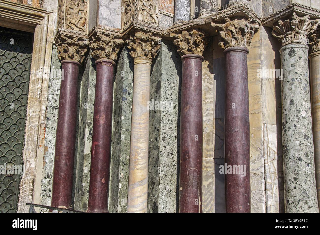 Close-up of columns and capitals made of various types of marble on the ...