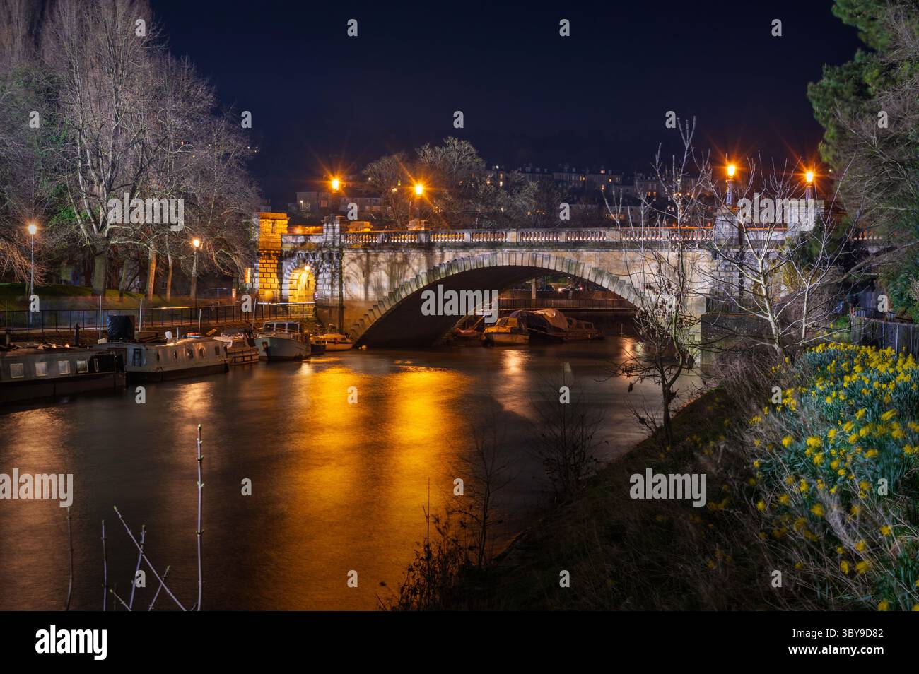 A night time view of North Parade Bridge across the River Avon as seen ...