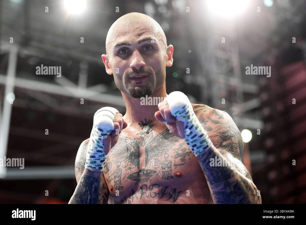 Lasha Guruli celebrates winning their Super lightweight bout against ...