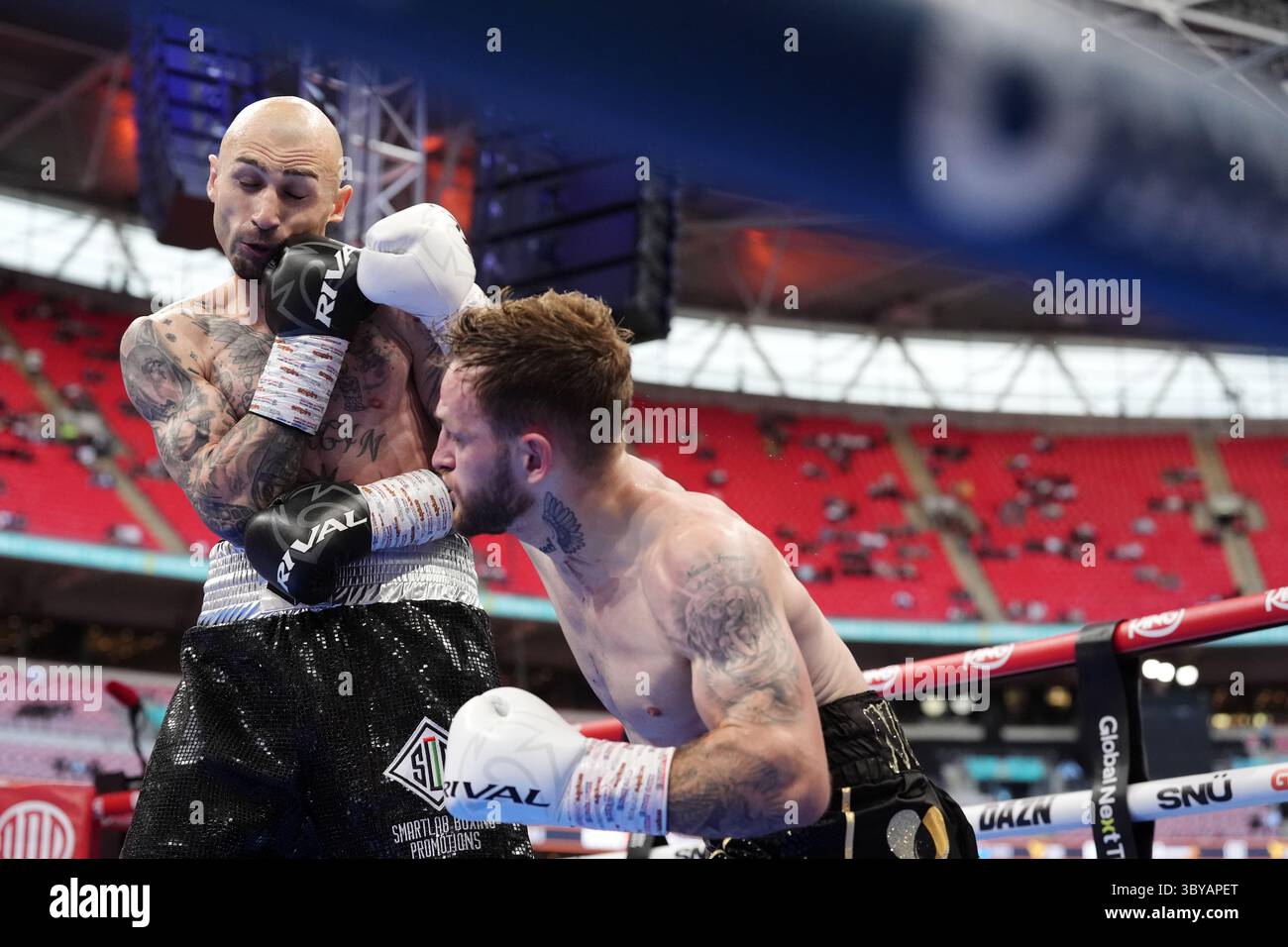 James Francis (right) lands a punch on Lasha Guruli during their Super ...