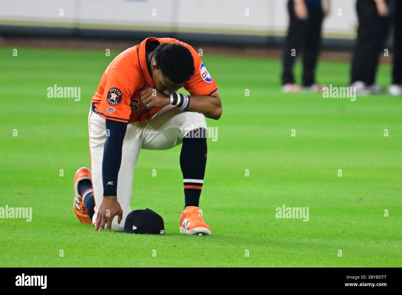 Houston Astros second base Brice Matthews (28) takes a knee in prayer ...