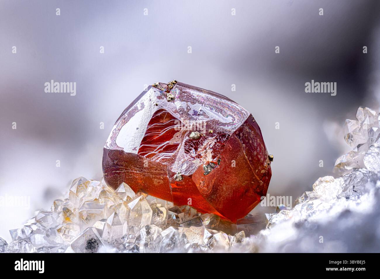 Red Sphalerite with pyrite, on clear quartz and fluorite. Specimen from ...
