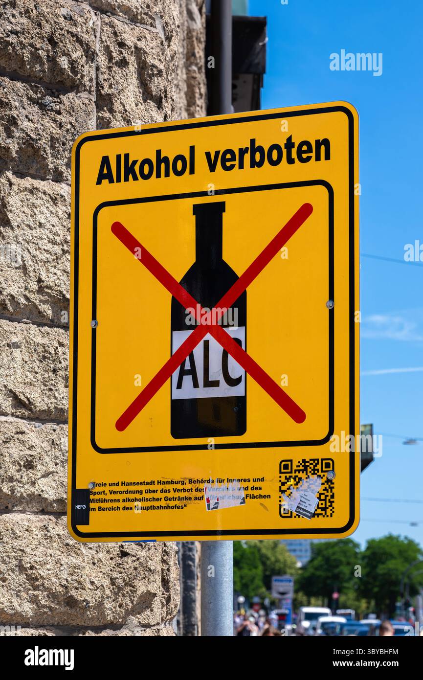 Hamburg, Germany - June 30, 2025: A bright yellow sign with a black ...