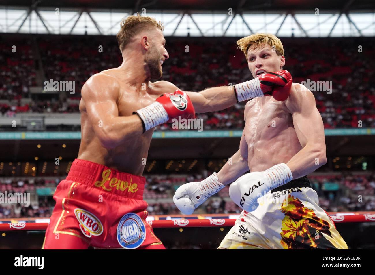 Lewis Edmondson (left) lands a punch on Daniel Lapin during their IBF ...
