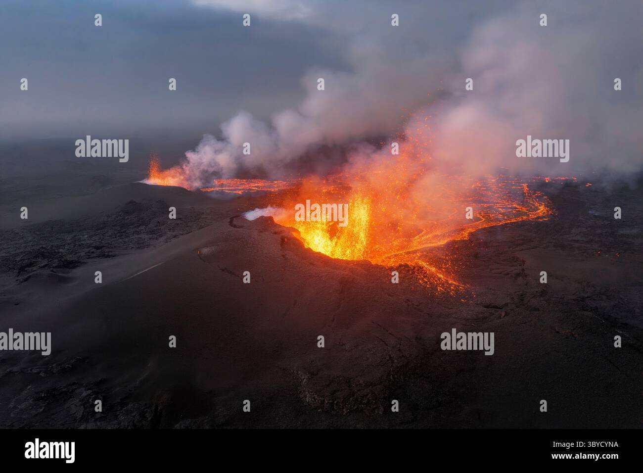 A view of two cinder cones growing around the two active craters, after ...