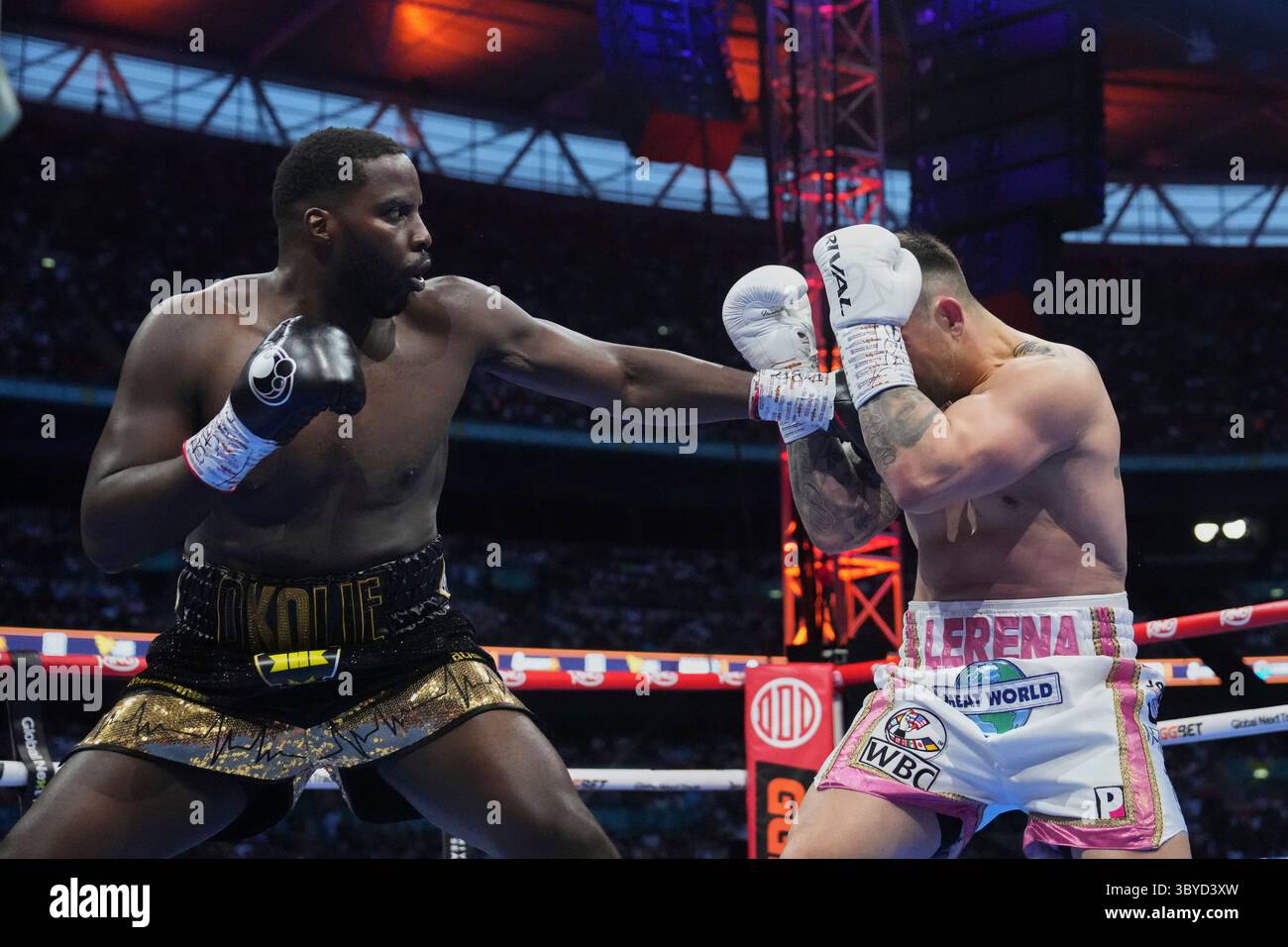 United Kingdom's Lawrence Okolie, left and South Africa's Kevin Lerena ...