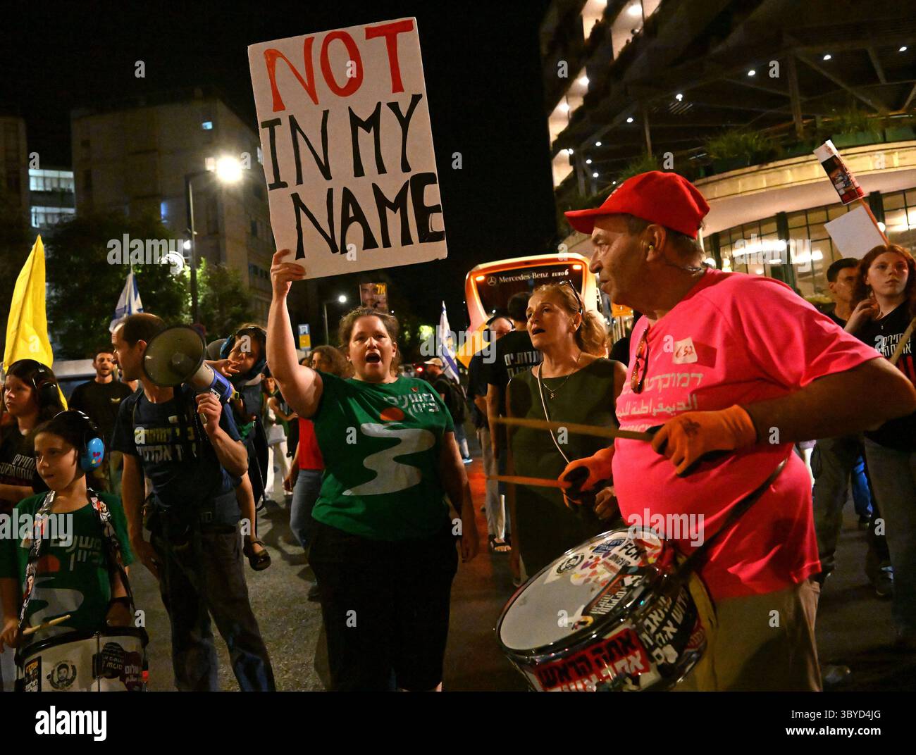 Jerusalem, Israel. 19th July, 2025. People carry placards calling for ...